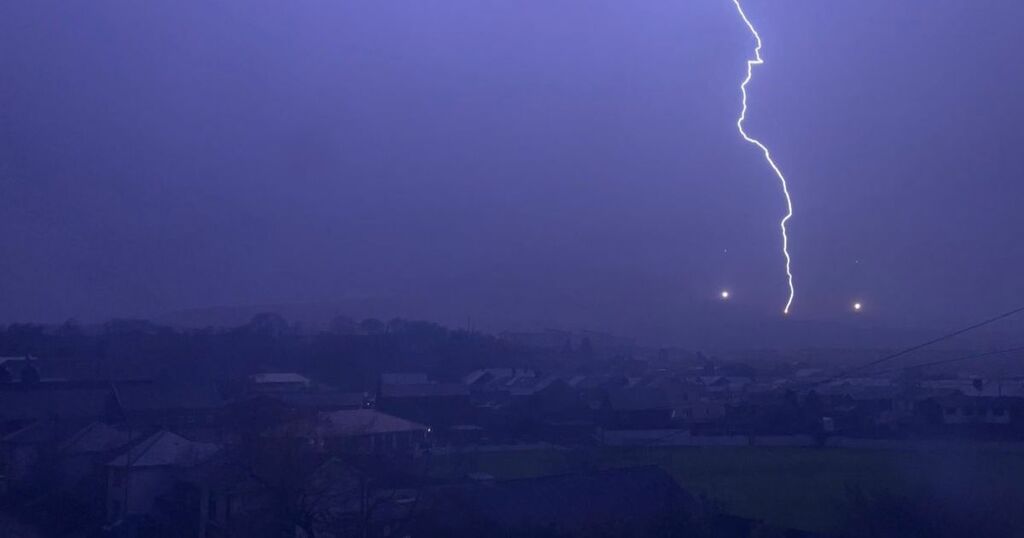 Pictures show amazing moment lightning bolt plunged…