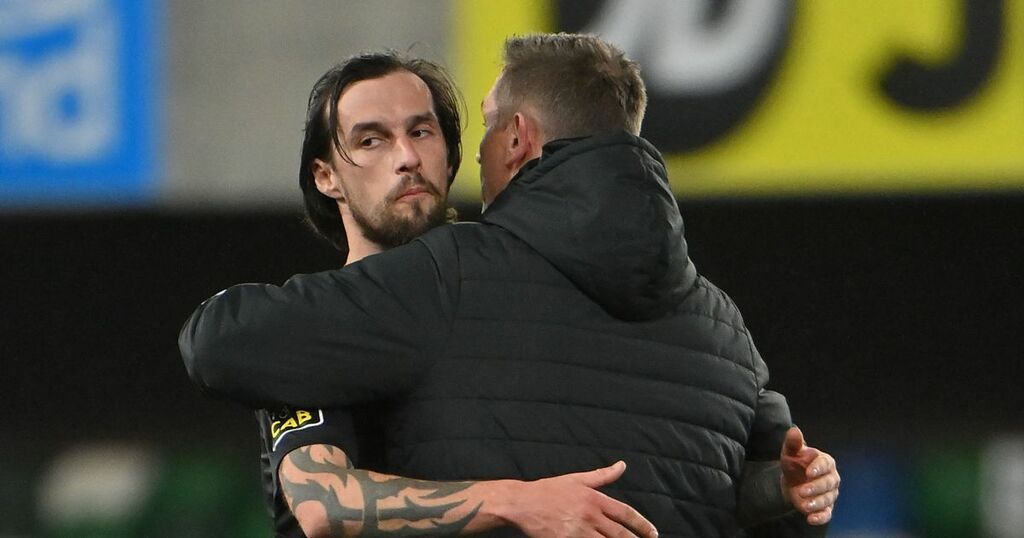 Stephen Baxter hails Declan Caddell as he helps…