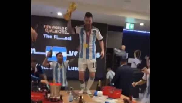 Lionel Messi dances on table with FIFA World Cup…