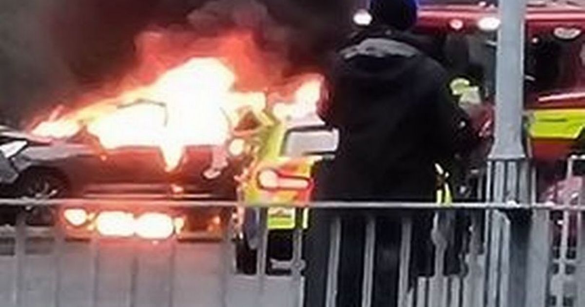 Car bursts into flames after pedestrian knocked down…