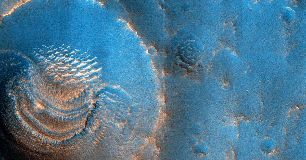 Incredible images show winter wonderland on Mars as…