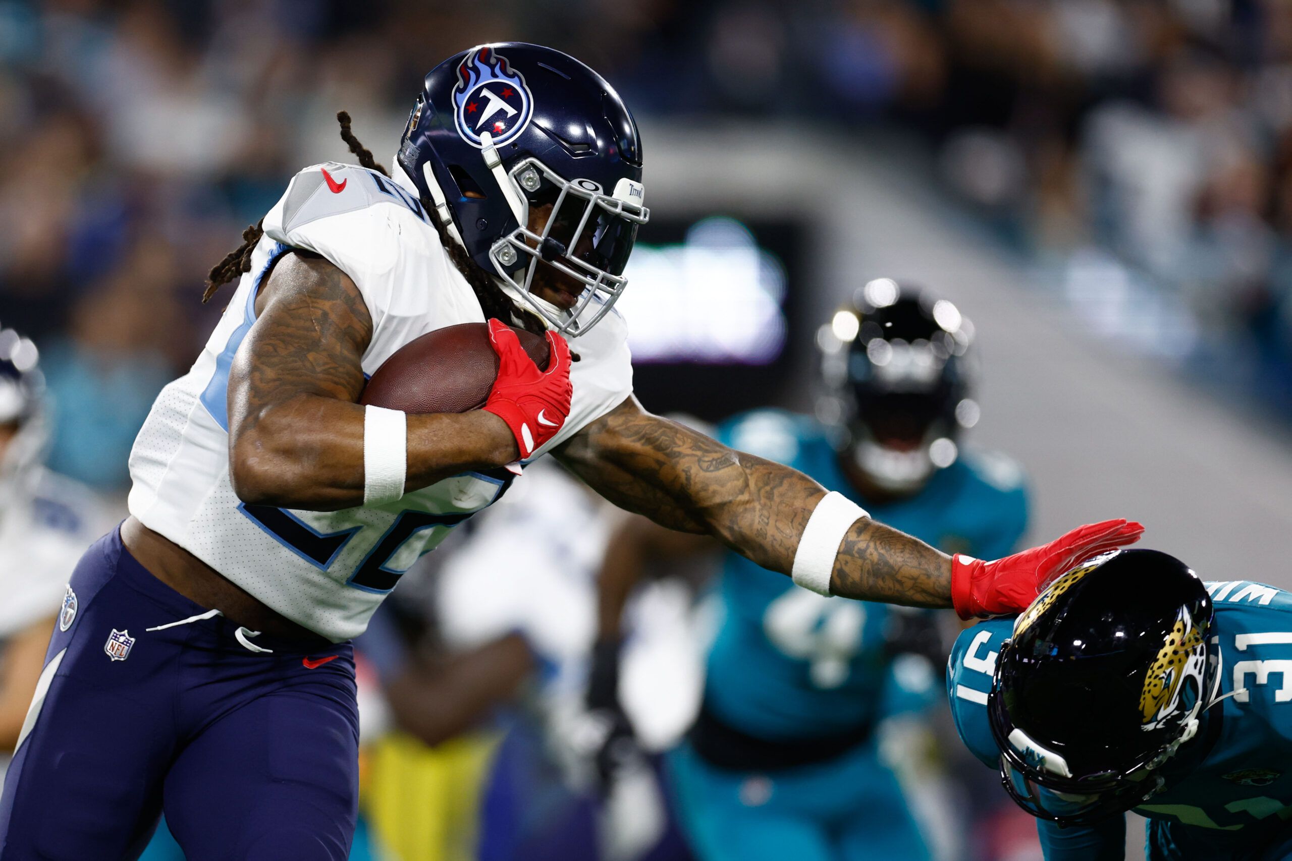 Derrick Henry stiff-arms Rayshawn Jenkins out of Duval…