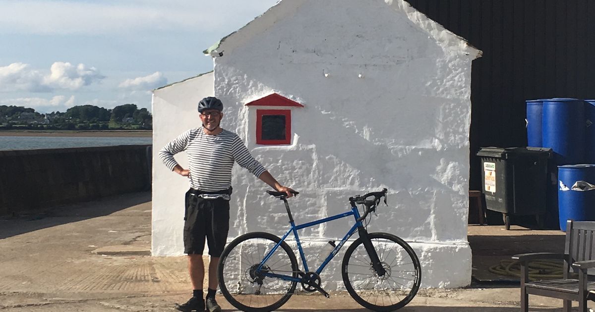 Bike-mad dad raises money for late wife's charity with…