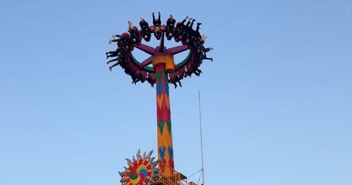 Terrified theme park riders trapped upside down 32ft…