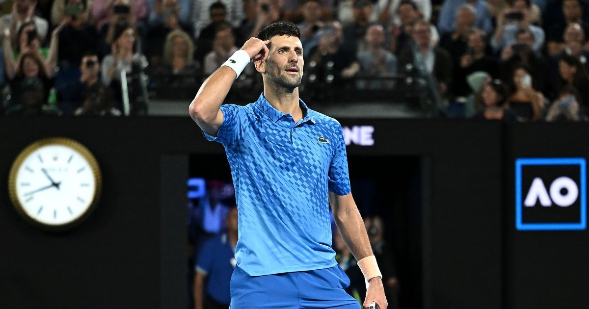 Marcus Rashford reacts as Novak Djokovic appears to…