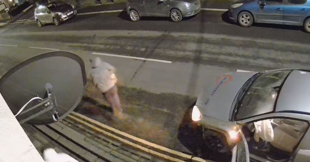 Two men who fled car crash caught on CCTV returning to…