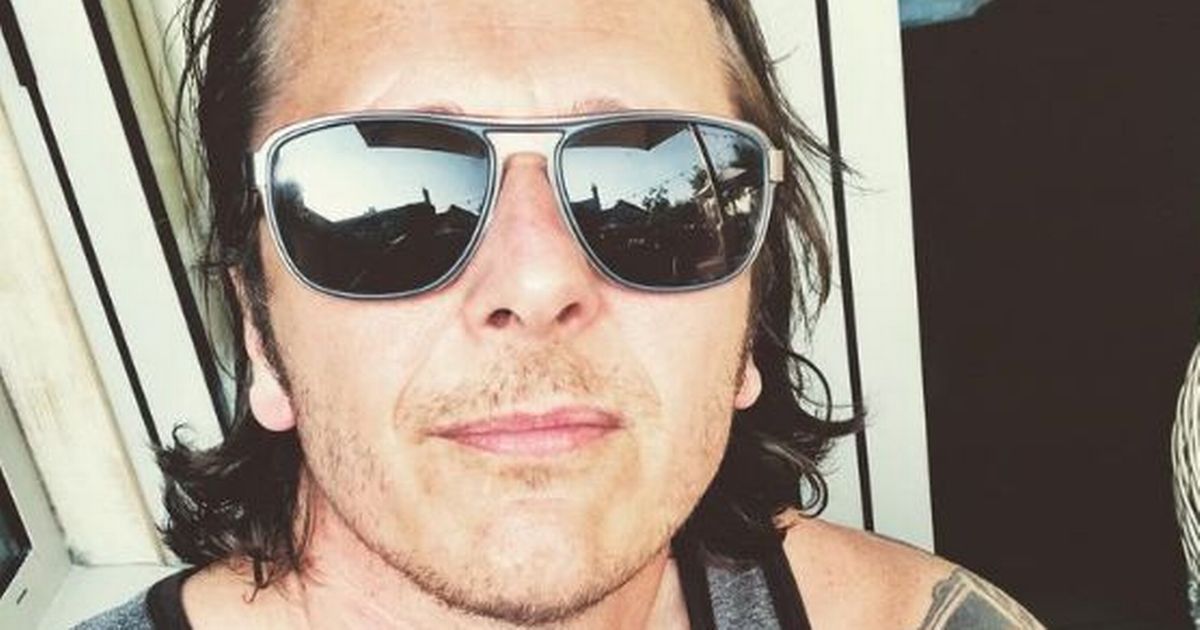 Boyband heartthrob is unrecognisable with tattoos and…