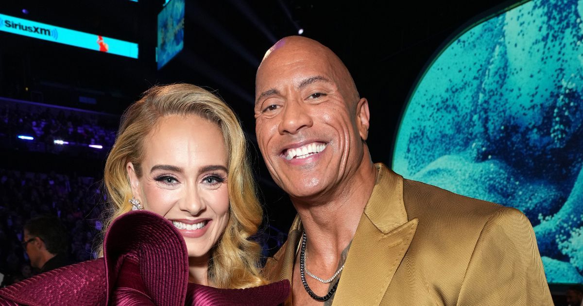 Adele blushes as she meets Dwayne Johnson at Grammys…