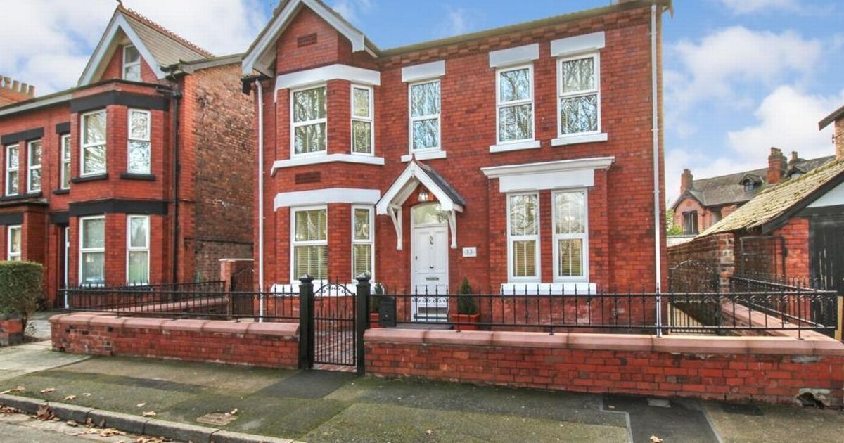 Period detached home that's been given an all-white…