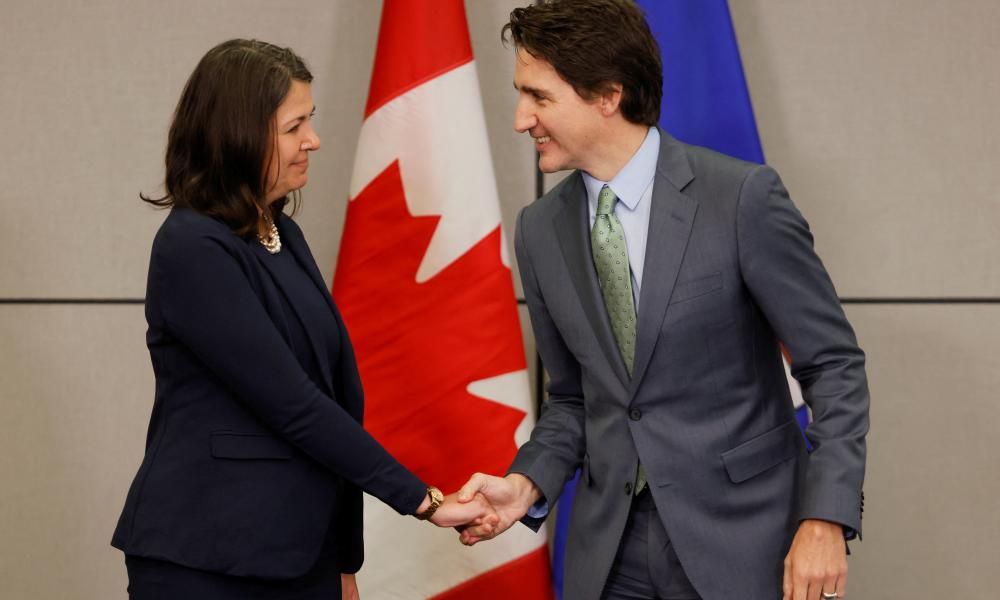 Canada’s Justin Trudeau greets political opponent with…