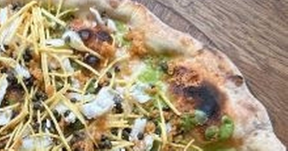 Restaurant unveils bizarre fish and chip pizza