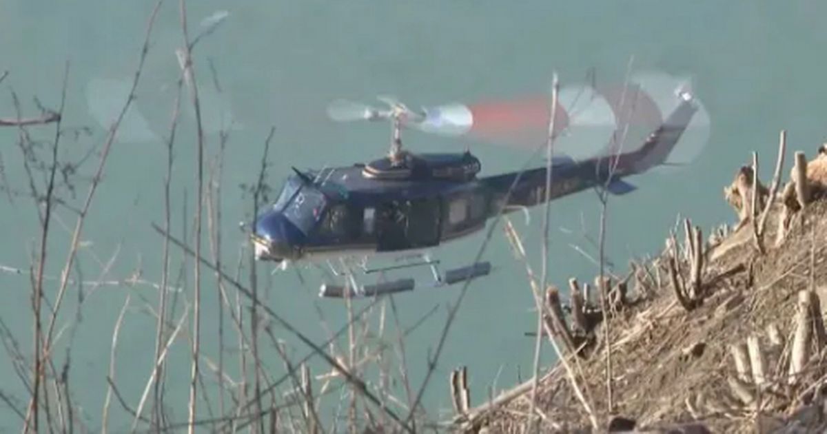 Boy, 5, survives as mum jumps 90ft with him to her…
