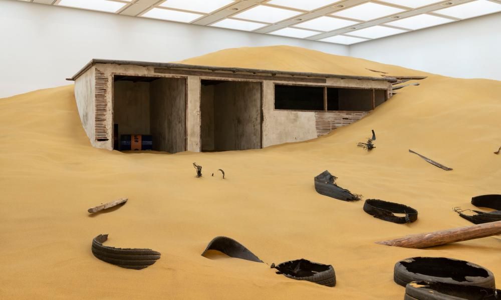 Mike Nelson review – spooky rooms and indoor deserts…