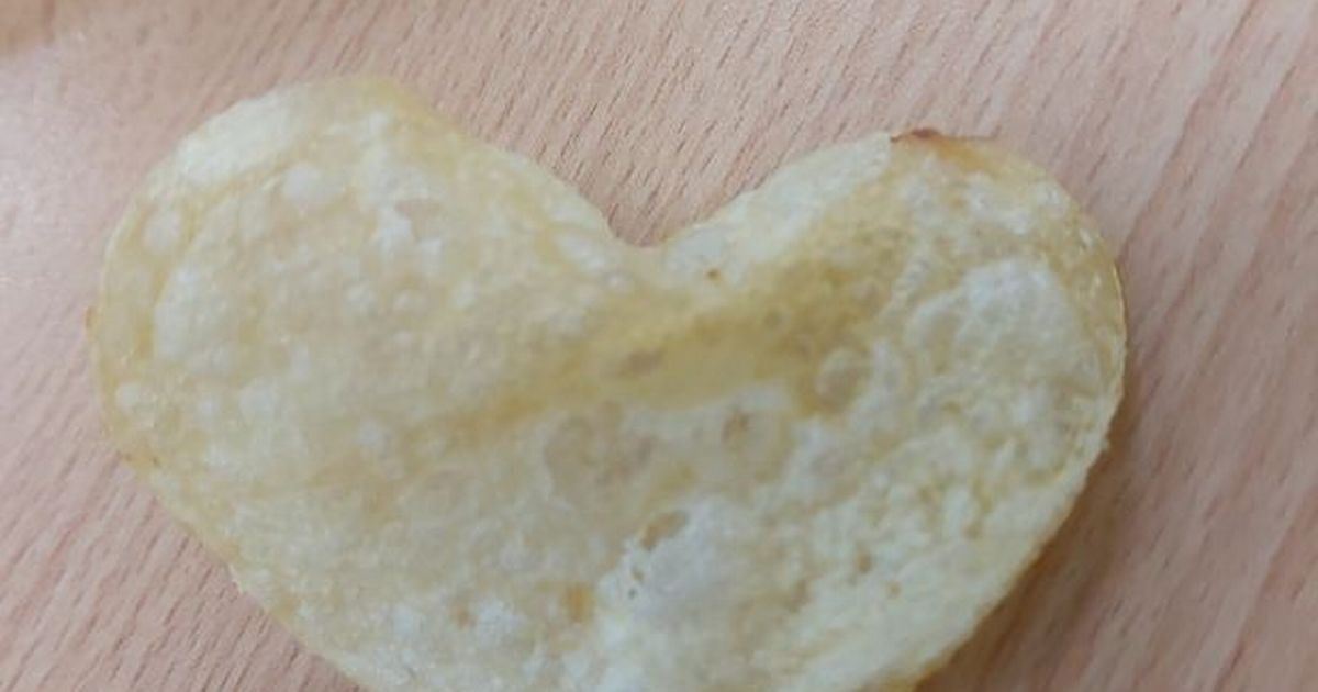 Mum left 'gutted' after eating heart-shaped crisp that…