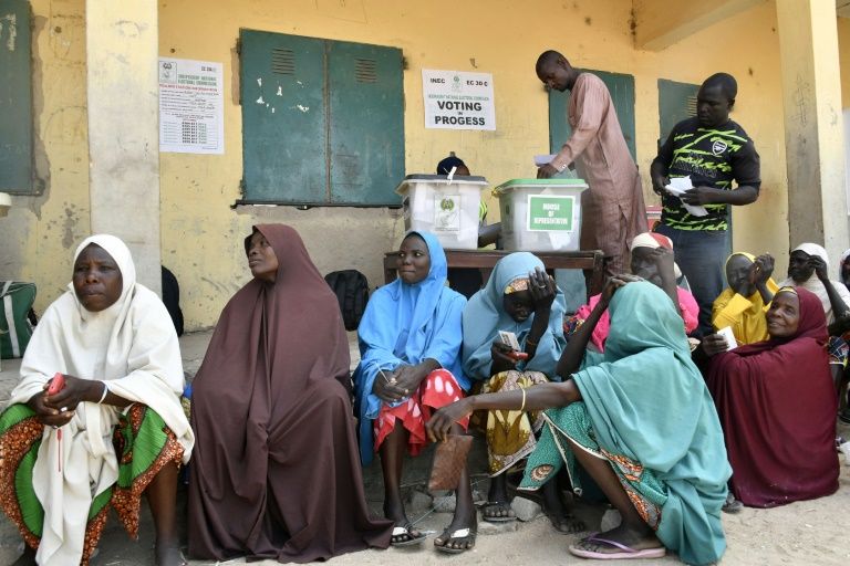 Nigerians vote for new president in tight election hit…