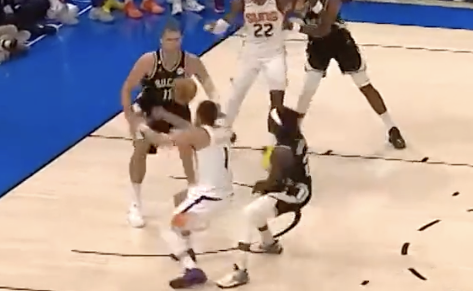 Jrue Holiday punking Devin Booker to win the game was…