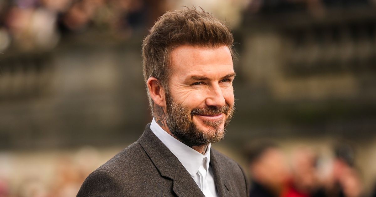 Manchester United great David Beckham reacts to photo…