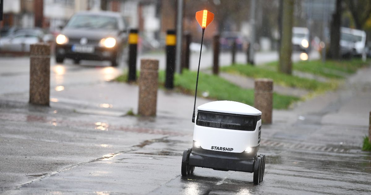 ROBOTS spotted driving along Greater Manchester street…