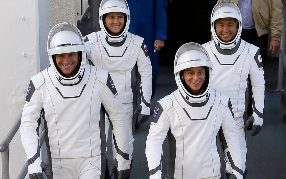 Elon Musk’s capsule brings space station foursome…