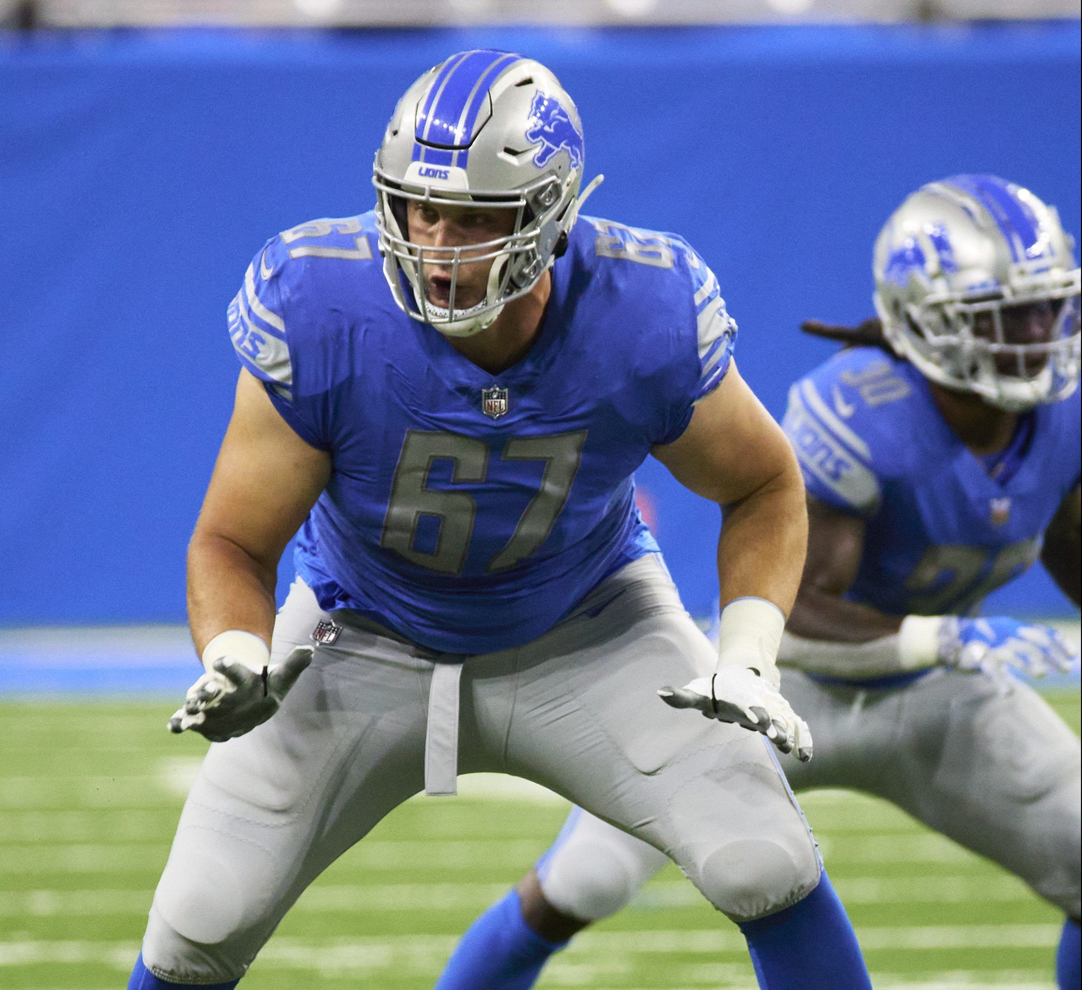 Lions bring back OT Matt Nelson