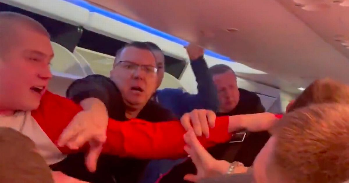 Thugs throw punches in bloody brawl on flight as kids…