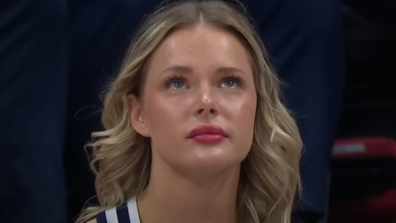 A March Madness Utah Cheerleader Reacted After Going…