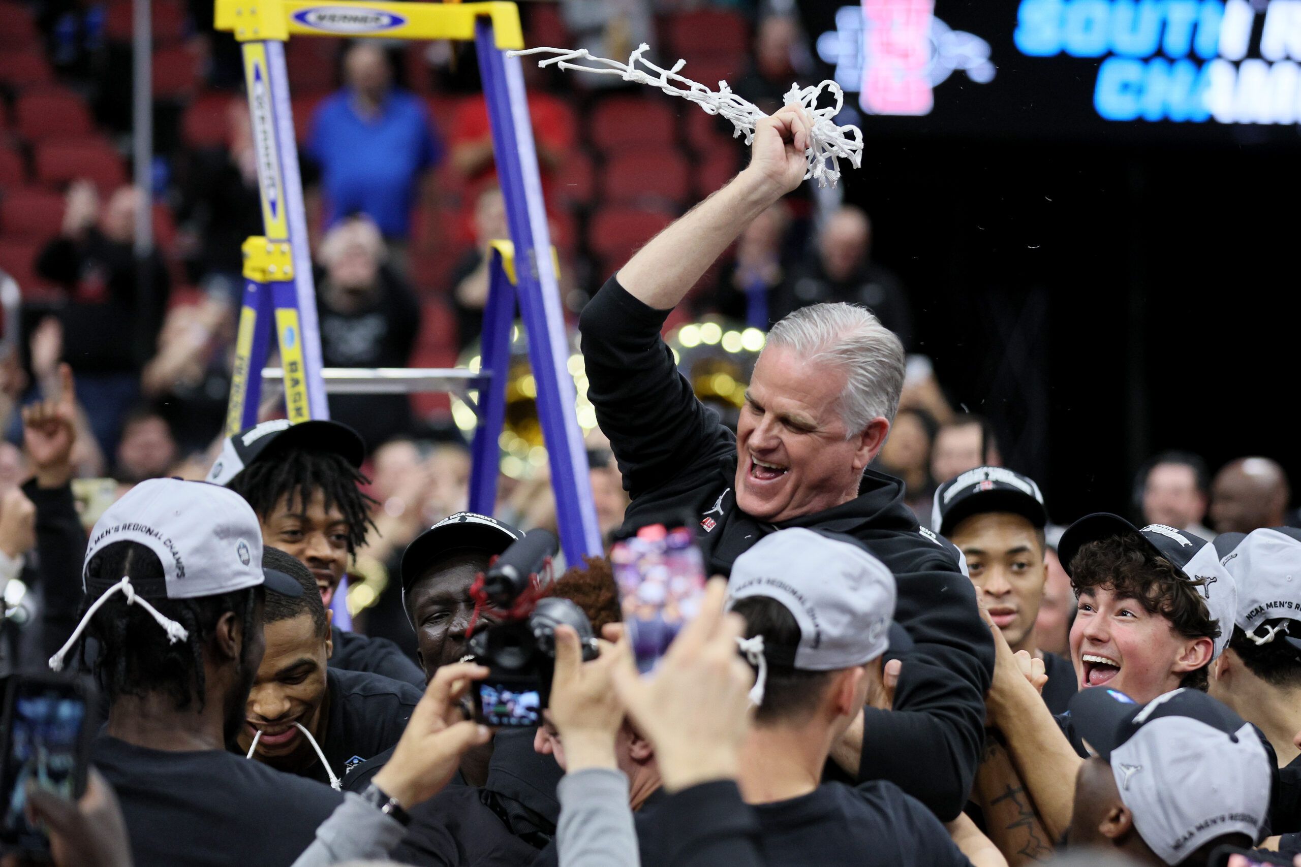San Diego State coach Brian Dutcher did a celebratory…