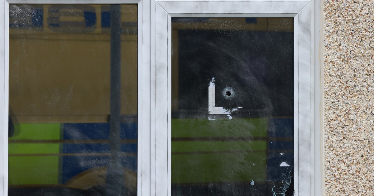 Bullet holes shatter window after man shot in house