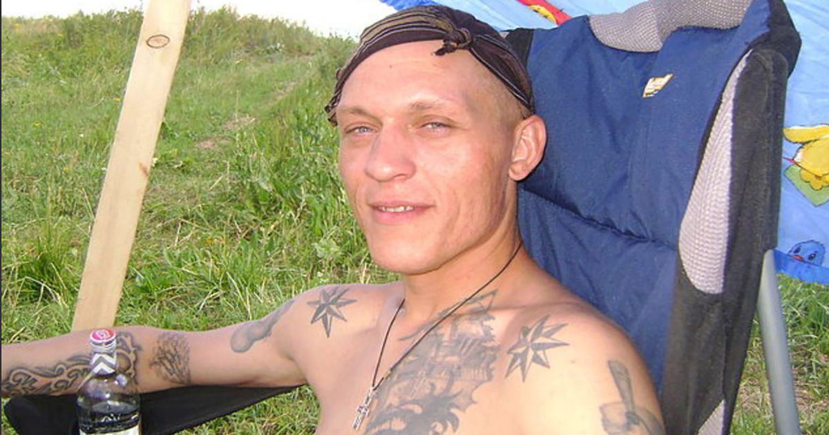 Killer who died fighting for Putin buried 'with…