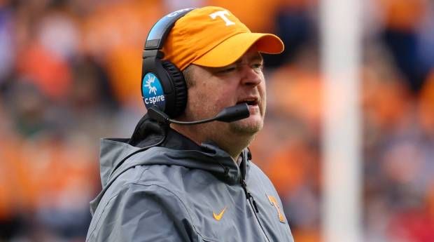 Sports Illustrated - Heupel Takes Photo With Fan Who…