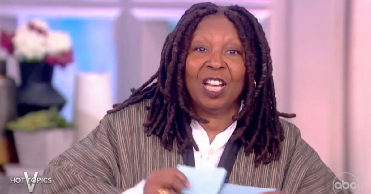 Whoopi Goldberg RIPS card in half as she furiously…