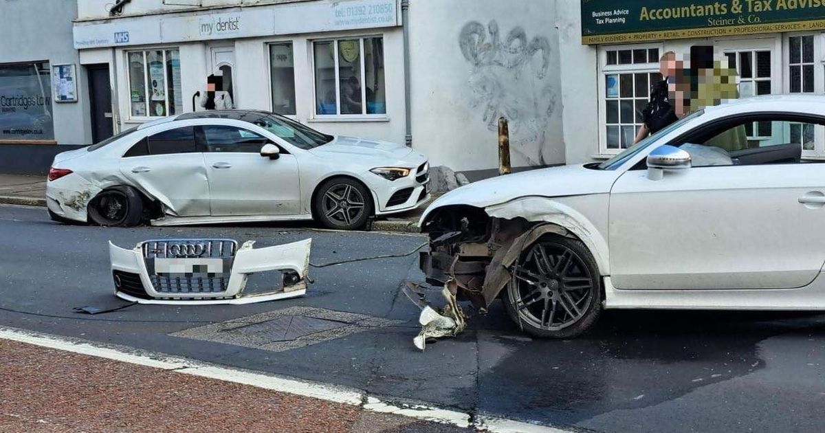 Bumper ripped off Audi as it smashes into Mercedes on…