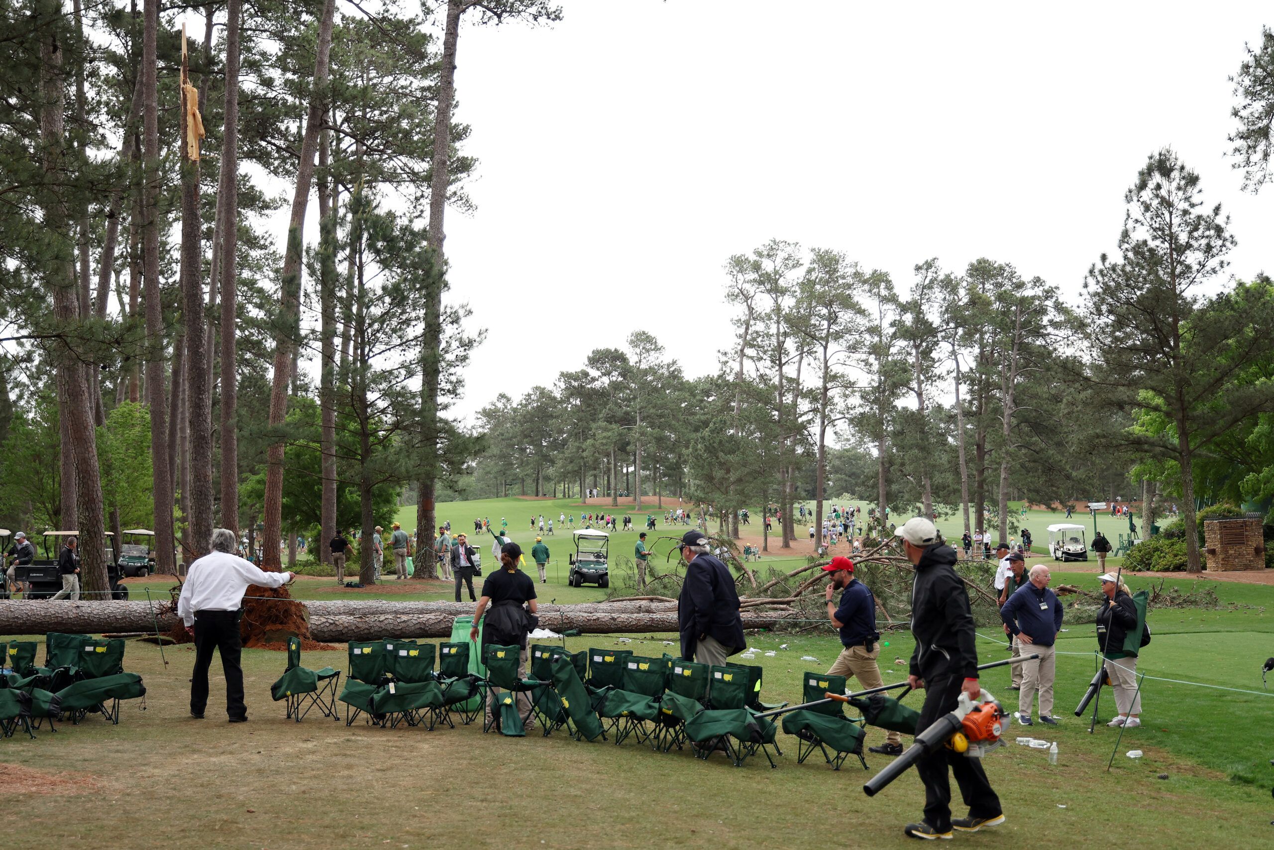 Golf fans fled as trees fell at Augusta National while…
