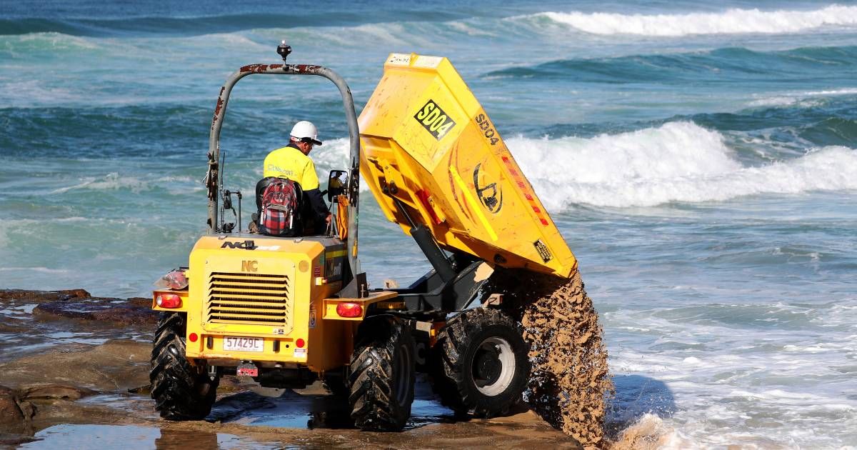 Massive swells swamp job site at Newcastle Ocean Baths