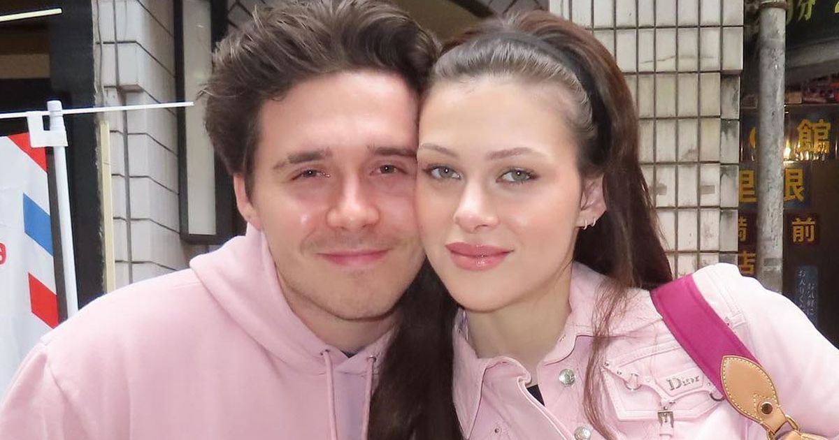 Nicola Peltz Beckham packs on the PDA in matching…