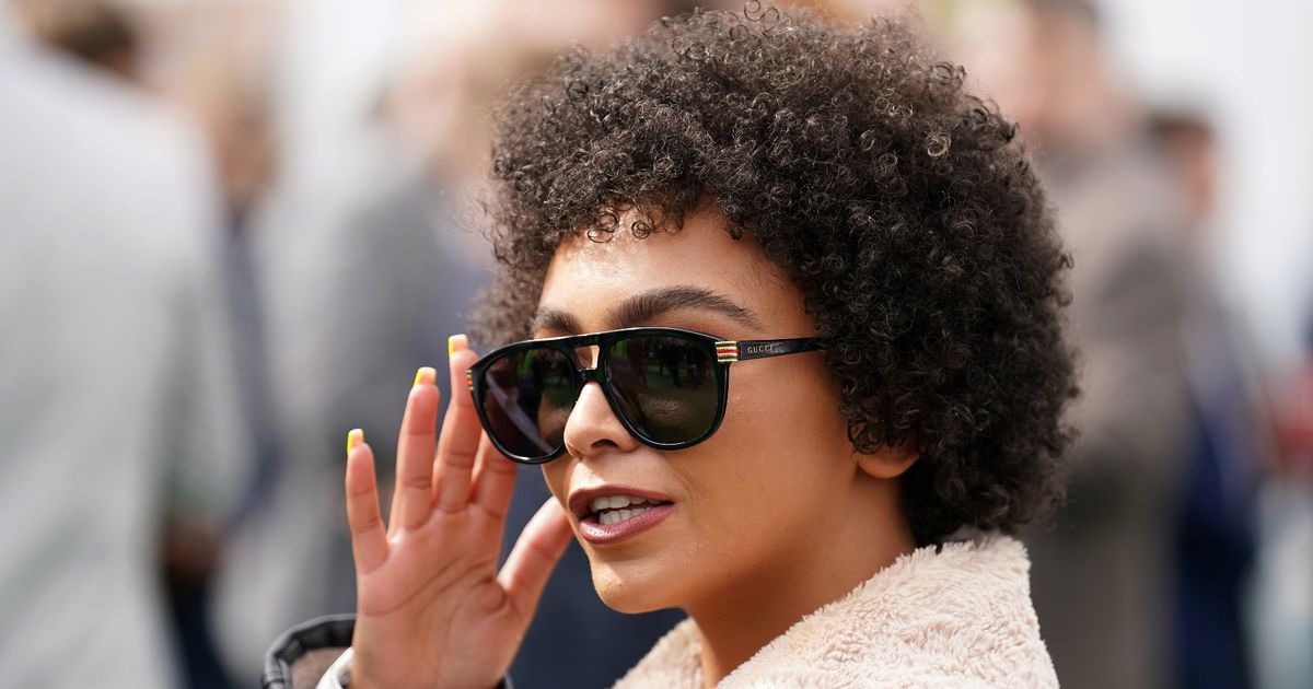 Grand National festival-goers look casual but stylish…