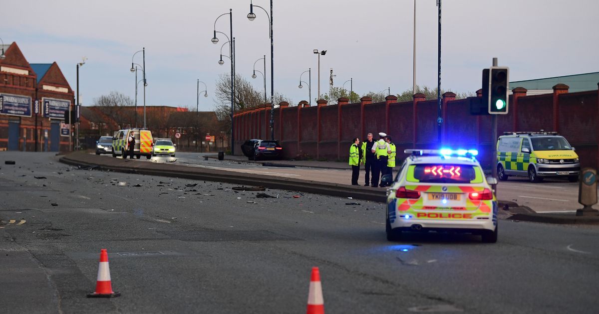 Debris scattered across road after multiple cars crash