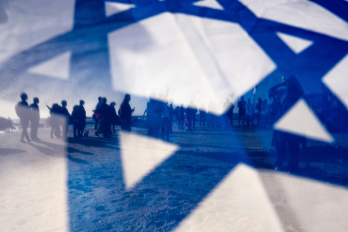 As Israel turns 75, its flag unfurls into deep…
