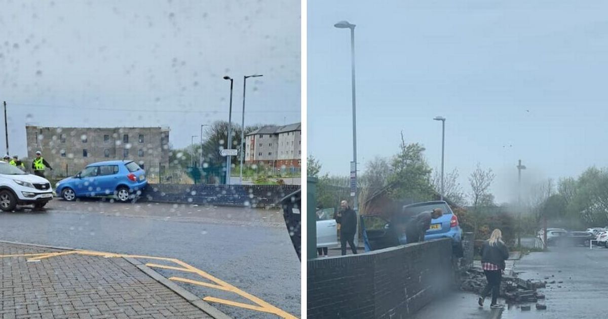 Car smashes through wall at Aldi supermarket car park