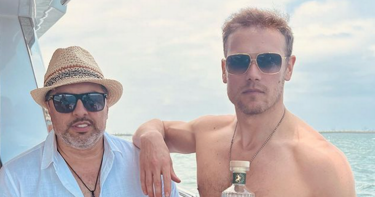 Sam Heughan poses on a yacht ahead of the release of…