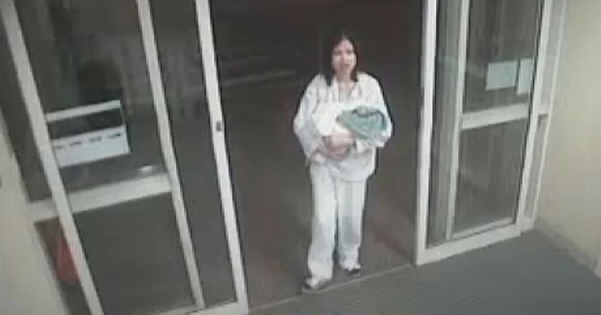 Heartbreaking CCTV shows mum clinging onto newborn…