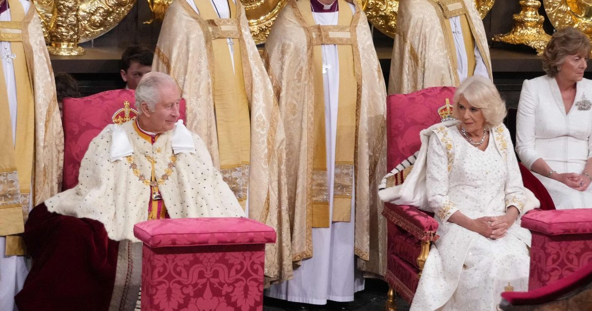 Queen Camilla looks 'confident and stoic' as she…