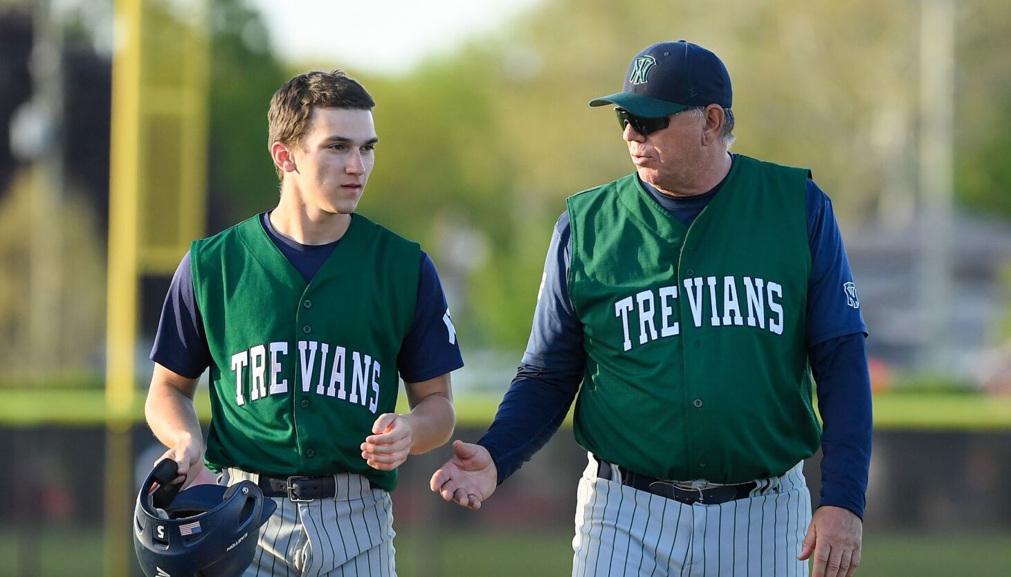 New Trier baseball coach Mike Napoleon breaks state…