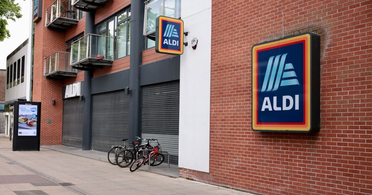 Aldi store closed off and police seen running inside…