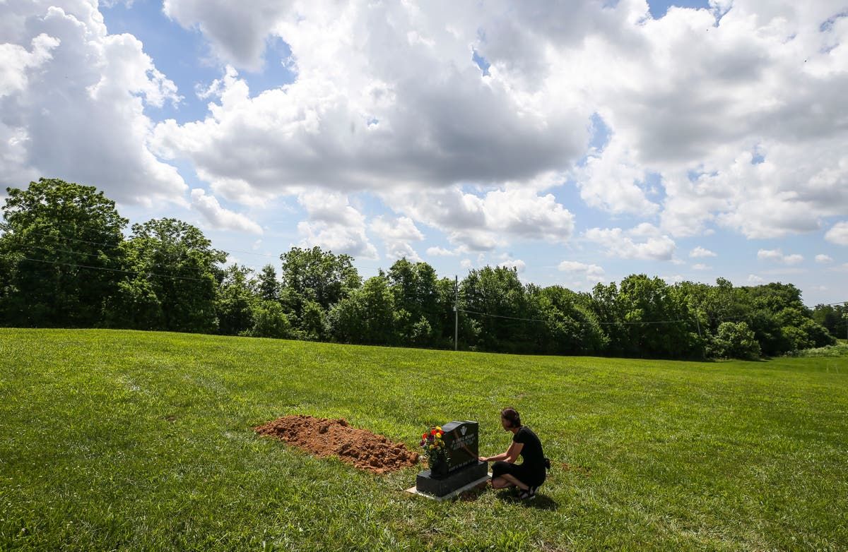 Woman charged in death of boy found in Indiana…