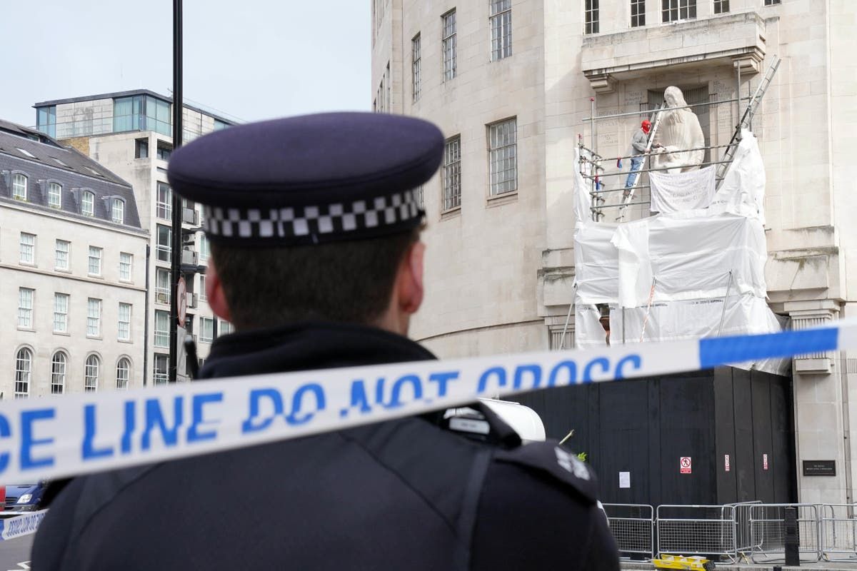 Masked man attacks controversial statue at BBC HQ with…
