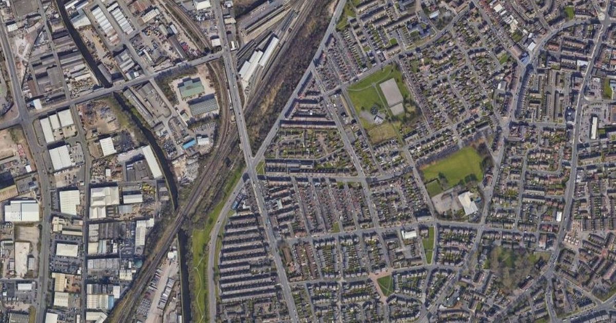 Street filled with black smoke after fire rips through…