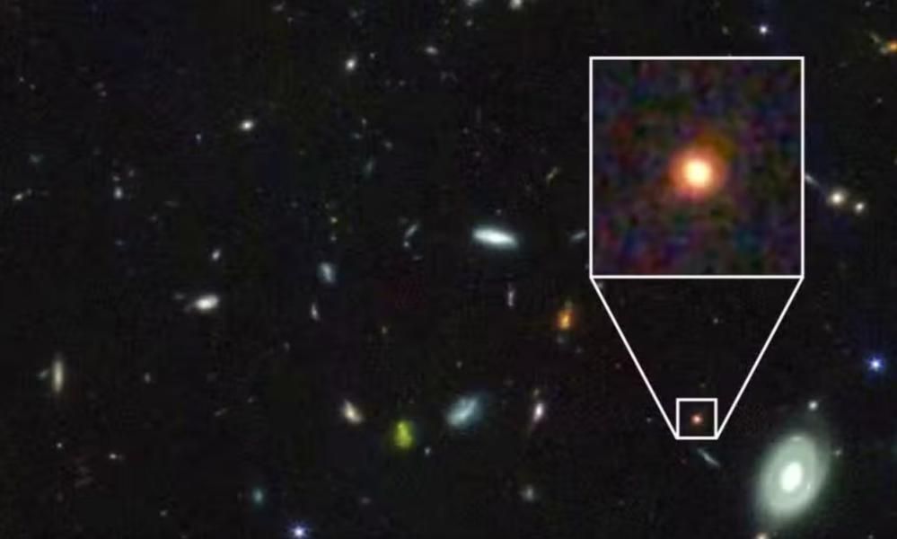 Supermassive black hole at heart of ancient galaxy…