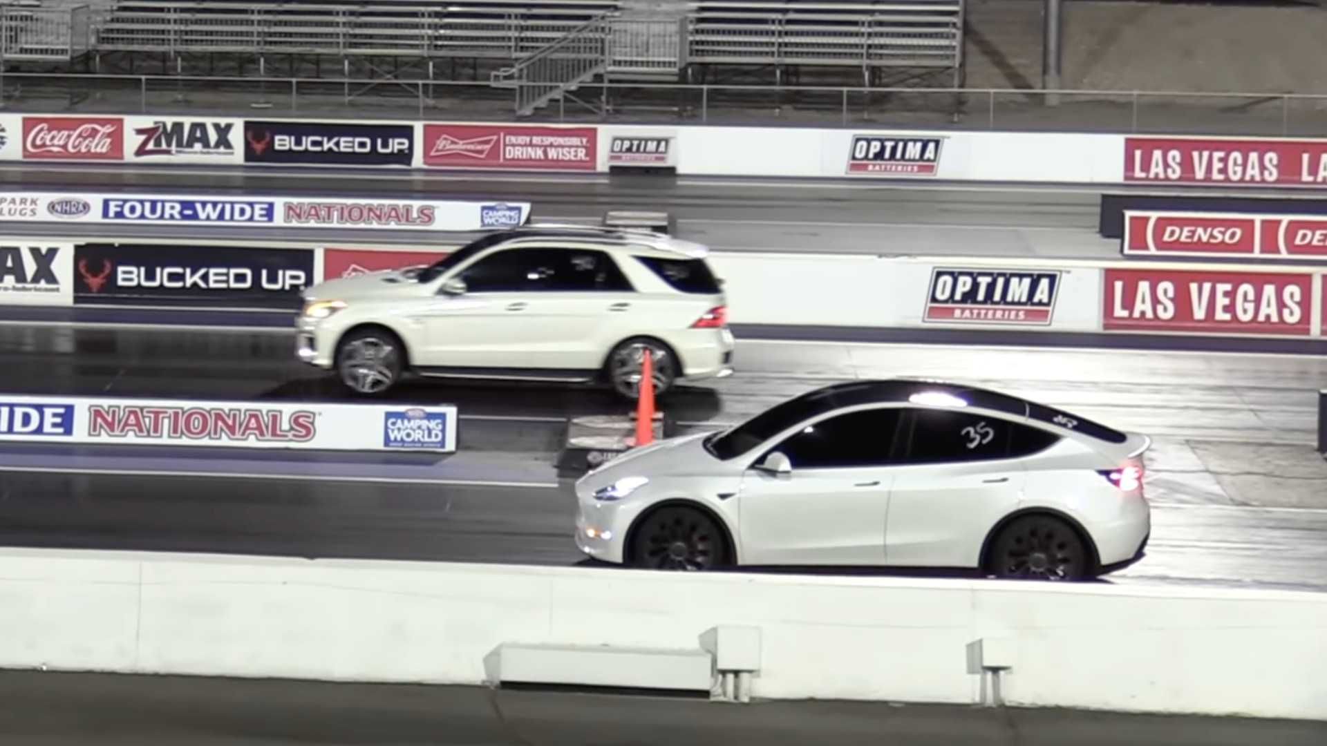 Watch Tesla Model Y Start Drag Race In Reverse, Still…