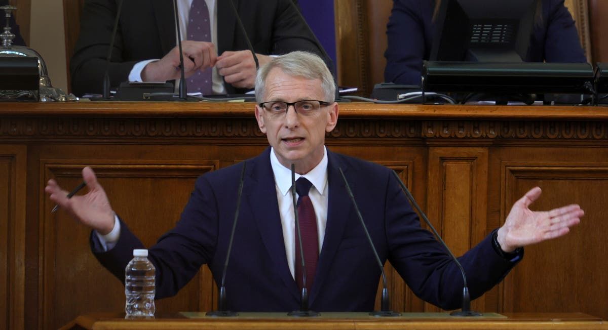 Bulgaria gets new government as former rivals enter…